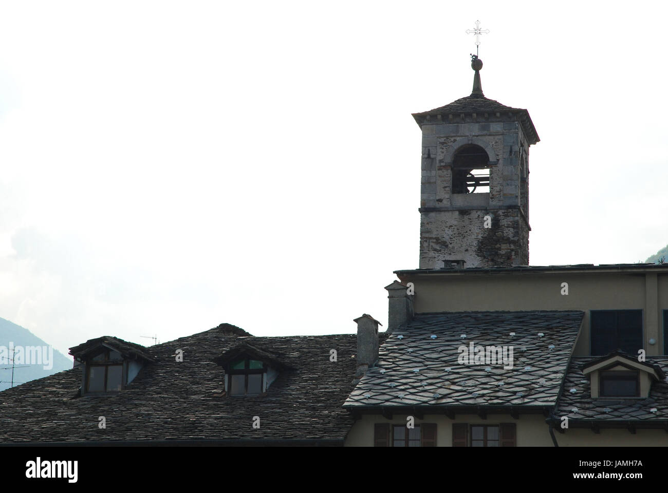 Switzerland,Ticino,shingle roofs,bell tower Stock Photo - Alamy