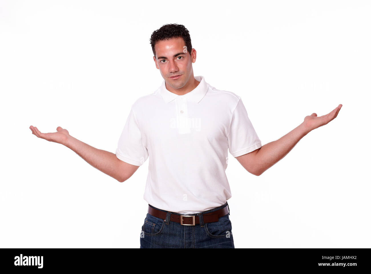 Portrait of a hispanic man on white t-shirt holding out his hands while ...