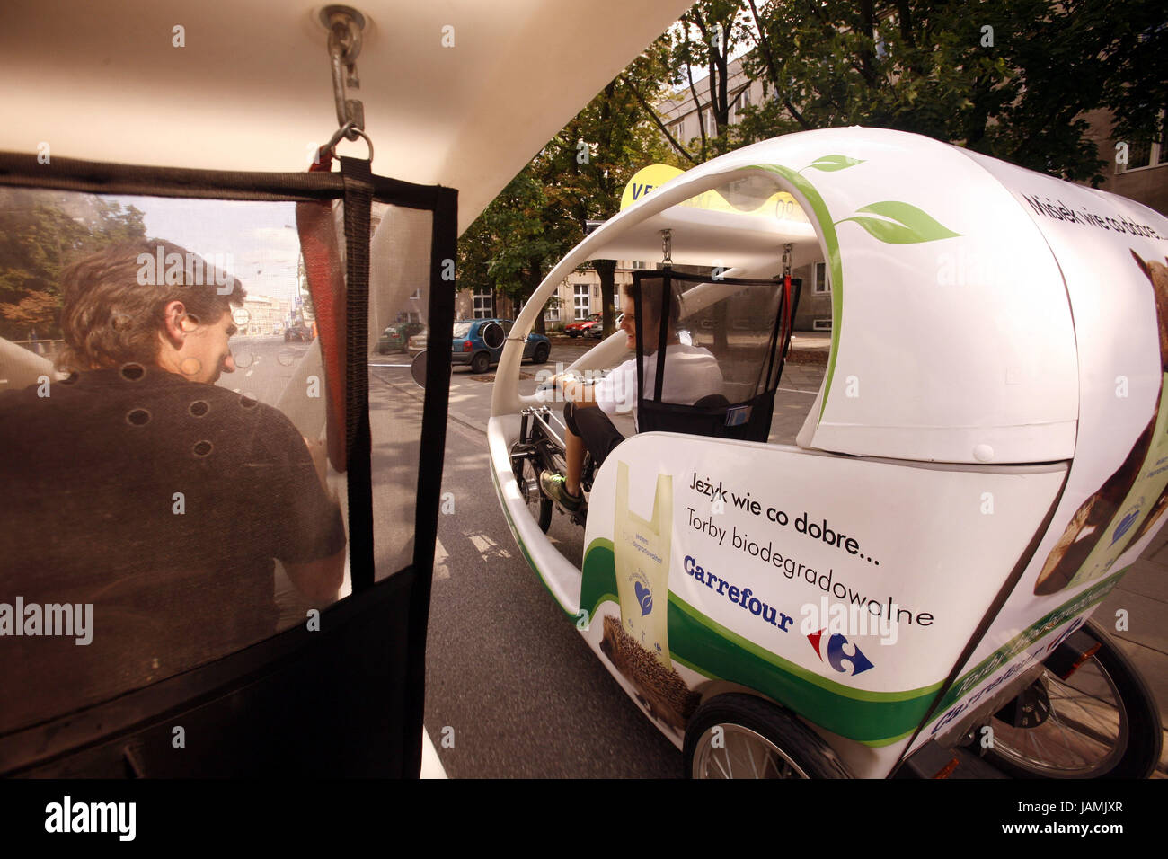 Poland,Warsaw,Old Town,ecological taxi,environment Stock Photo - Alamy