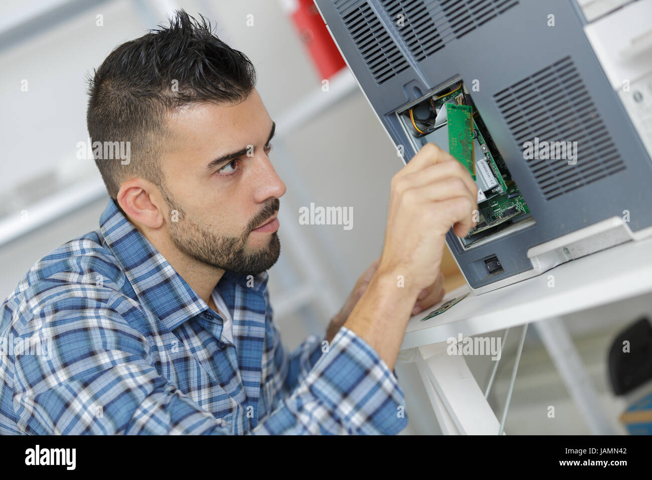 man holding a disk Stock Photo - Alamy