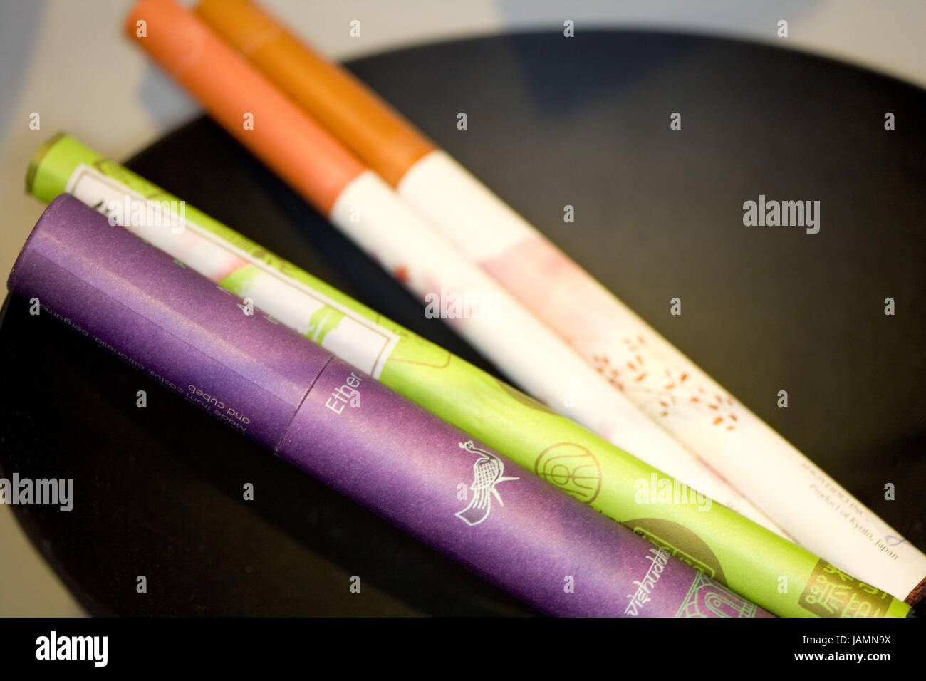 Packets of joss sticks hi-res stock photography and images - Alamy