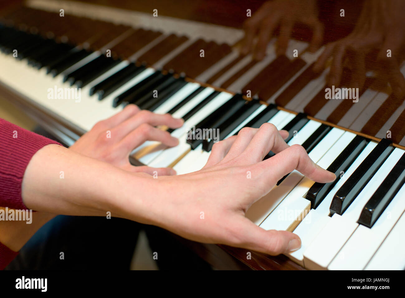 learn to play piano hands detail Stock Photo - Alamy