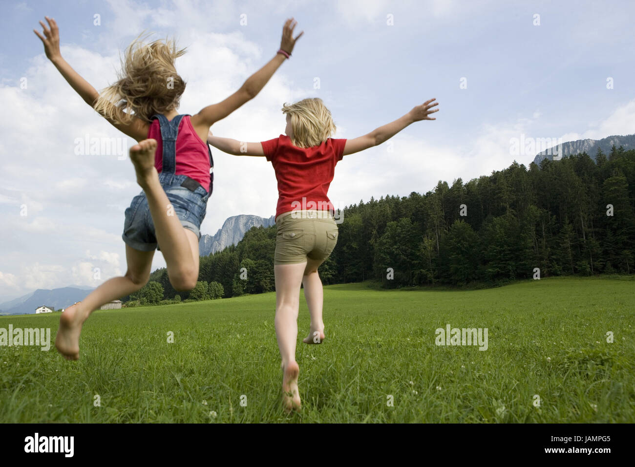Friends jump back view hi-res stock photography and images - Alamy