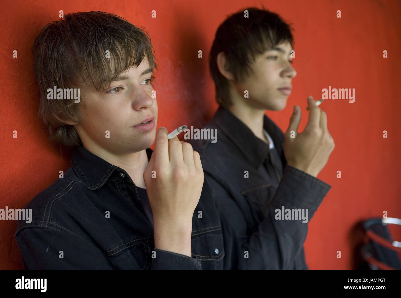 Two boys with cigarettes hi-res stock photography and images - Alamy