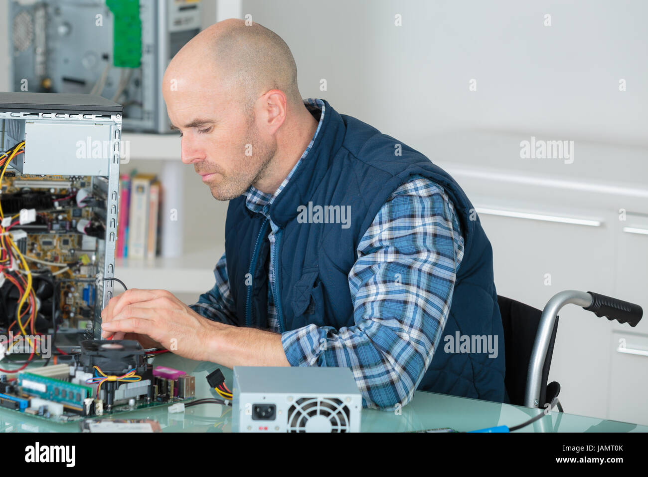 computer specialist hold cables Stock Photo - Alamy