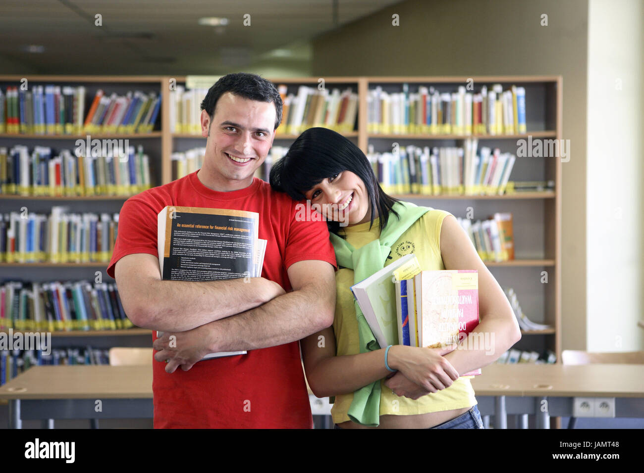 University,library,student,couple,happily,books,carry,half portrait ...