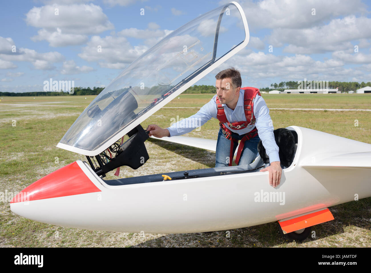 pilot sitting in cabin of small airplane Stock Photo - Alamy