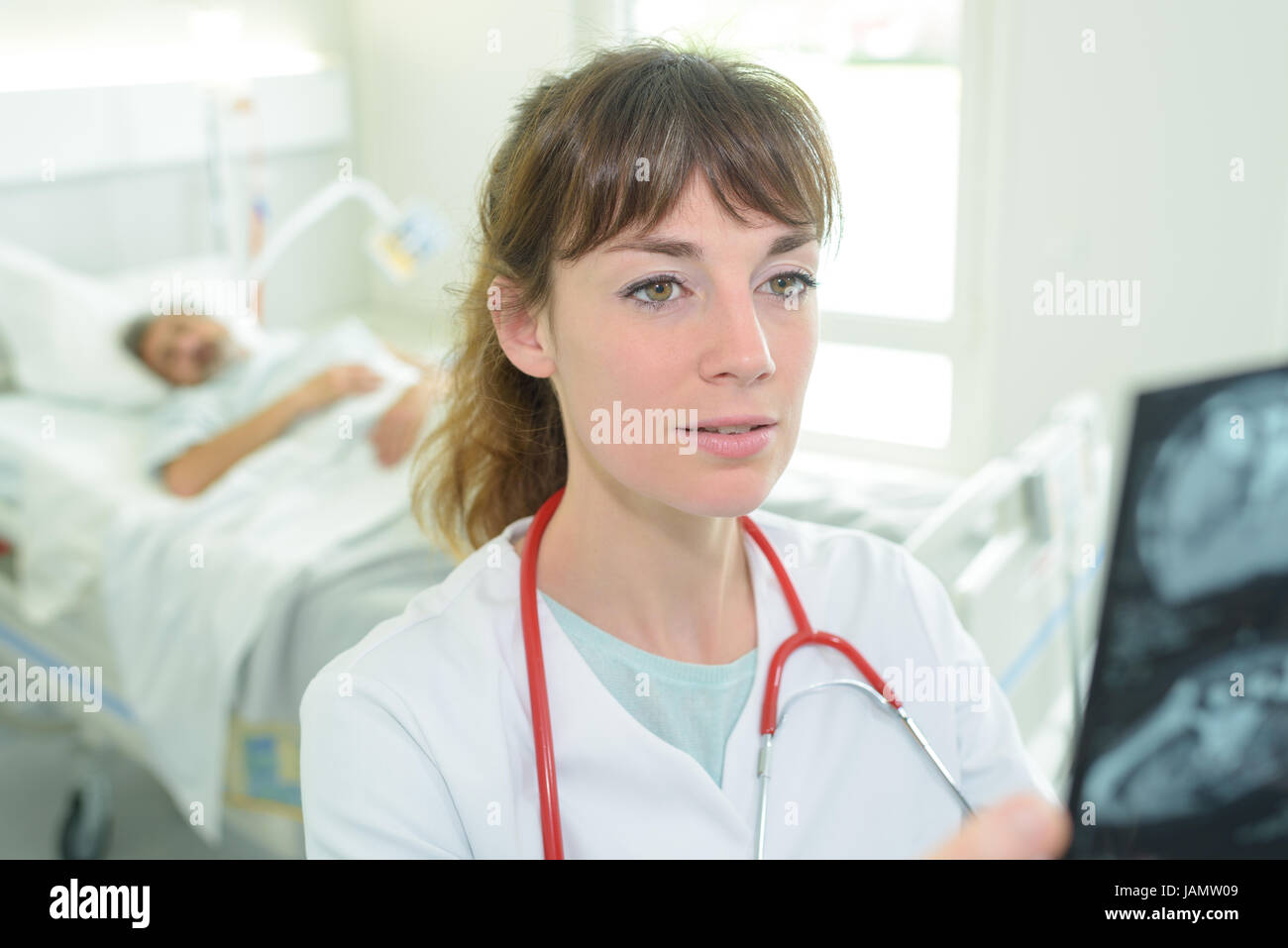 radiologist checks x-ray in hospital room Stock Photo - Alamy