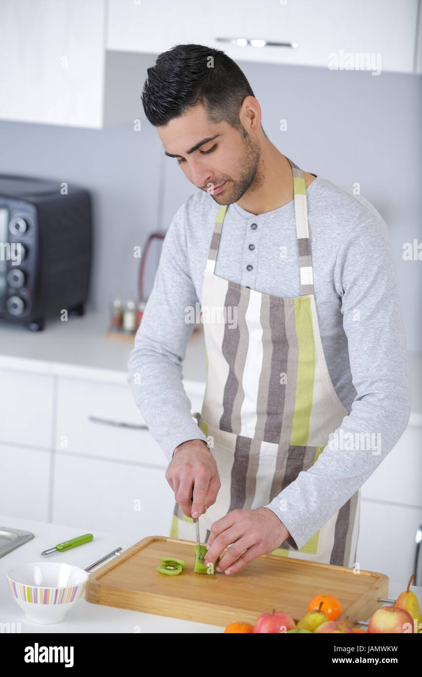Couple chopping vegetables table hi-res stock photography and images ...