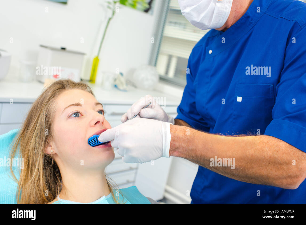 woman having her teeth moulded Stock Photo - Alamy
