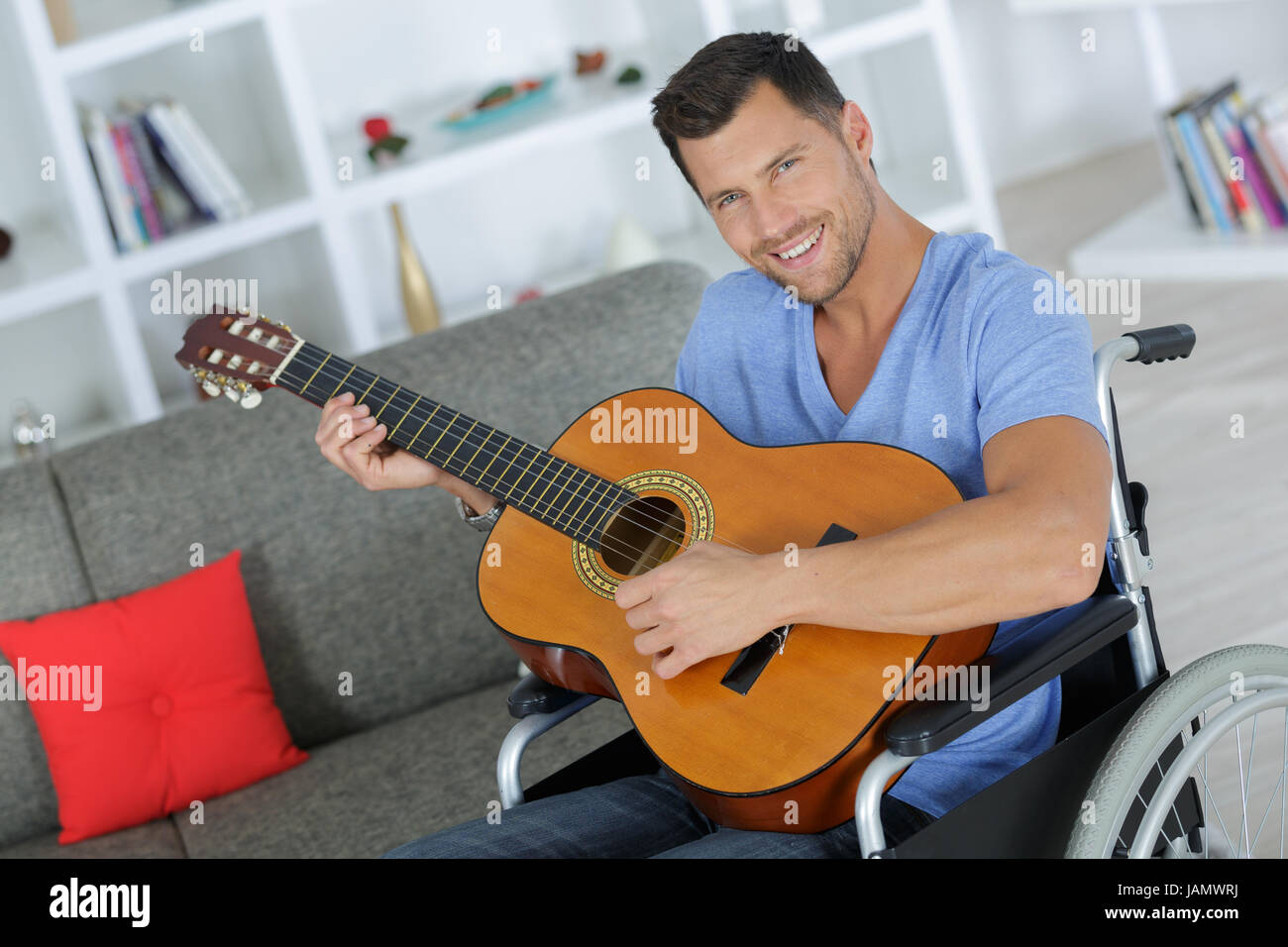 handsome handicapped guitarist Stock Photo - Alamy