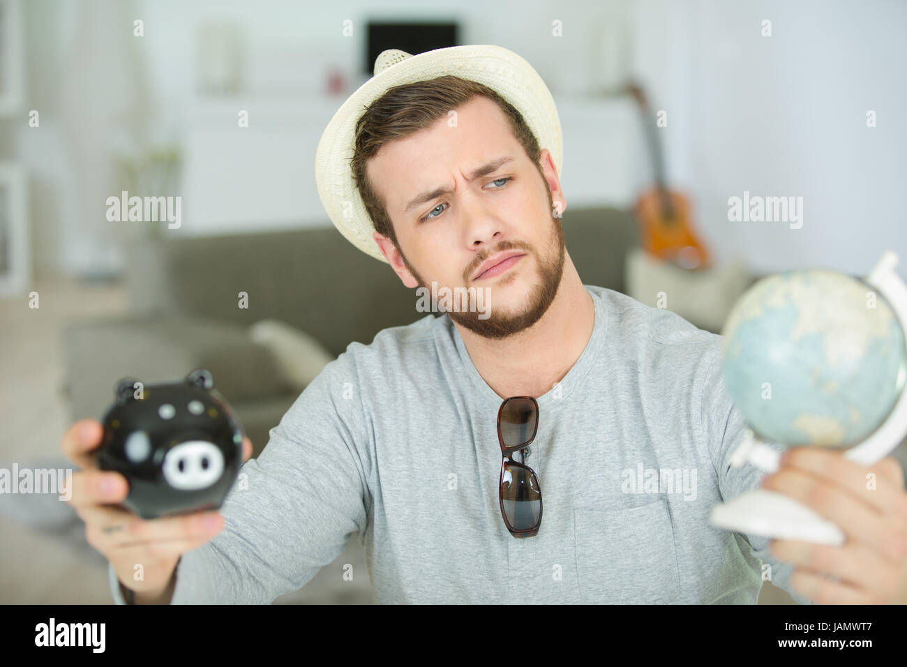 young man traveller choosing Stock Photo - Alamy