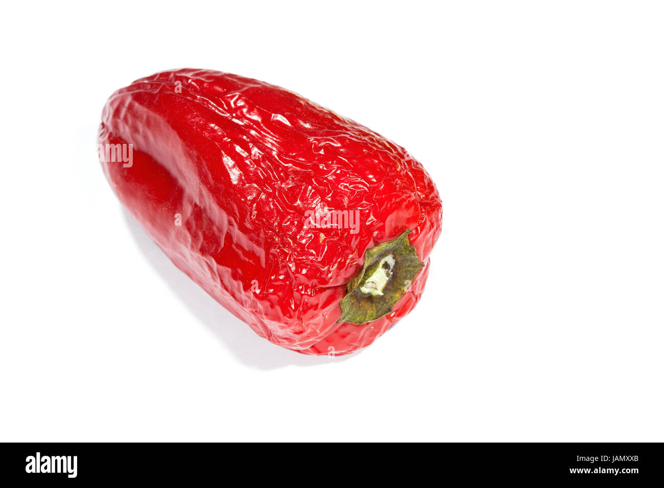 old pepper isolated on white background Stock Photo - Alamy