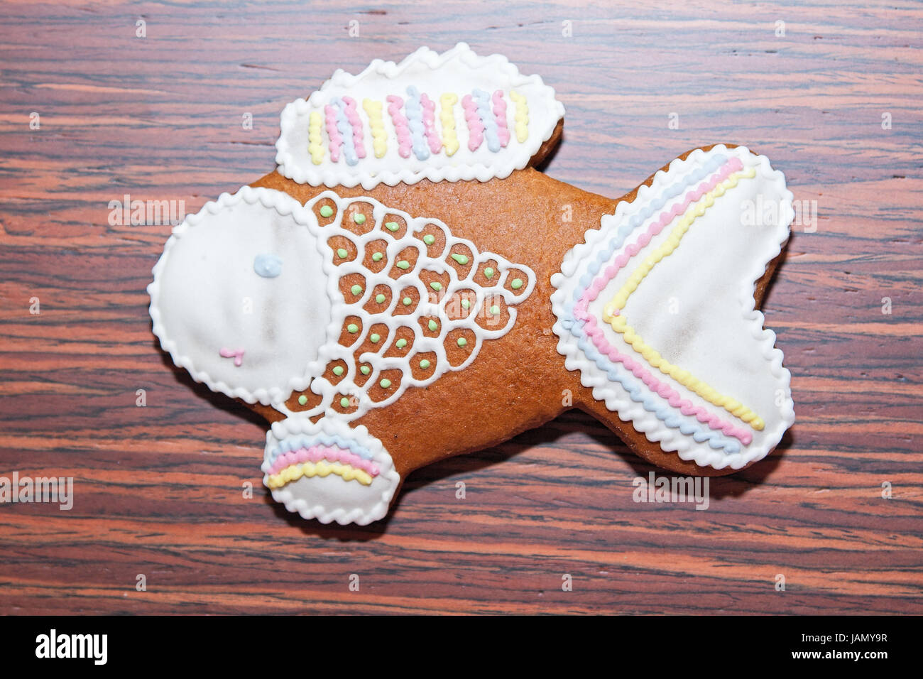 Gingerbread in the form of a fish on a wooden background Stock Photo ...