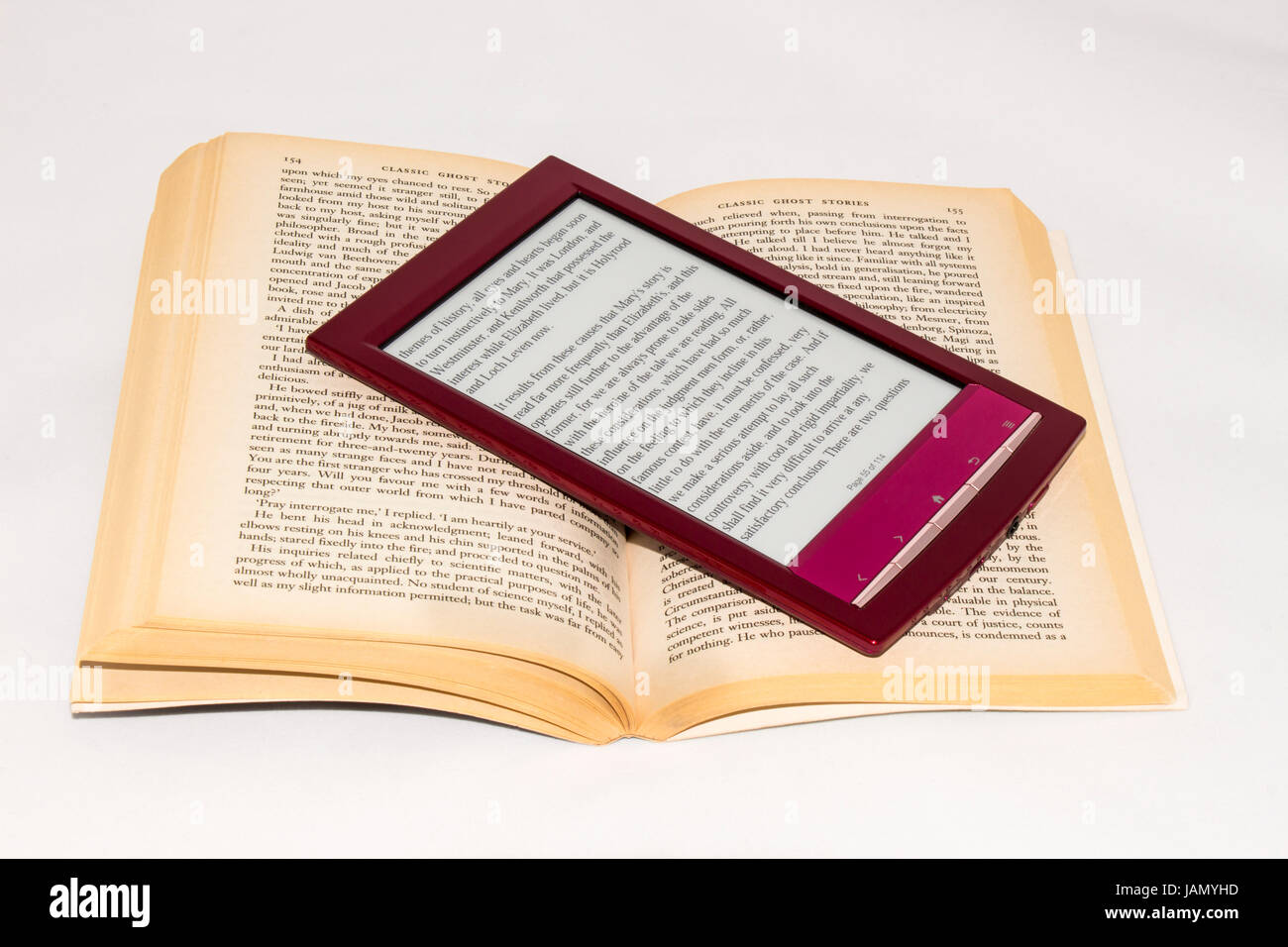E-reader and an old book Stock Photo - Alamy