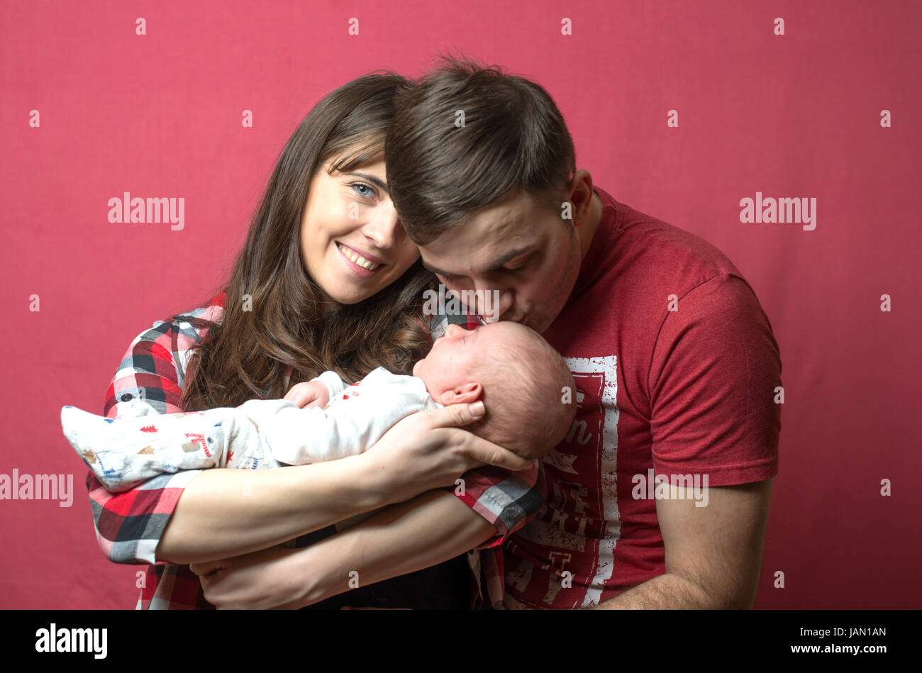new born baby with parents Stock Photo - Alamy