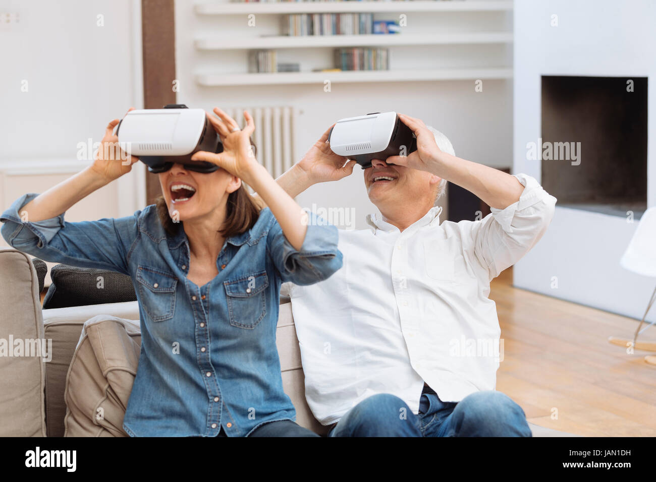 Vr mature senior woman headset hi-res stock photography and images - Alamy