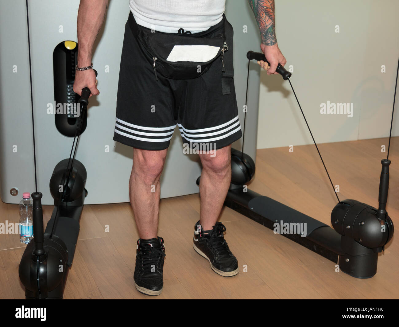 Fitness Workout in Gym: Boy doing Crossfit Exercises Stock Photo - Alamy