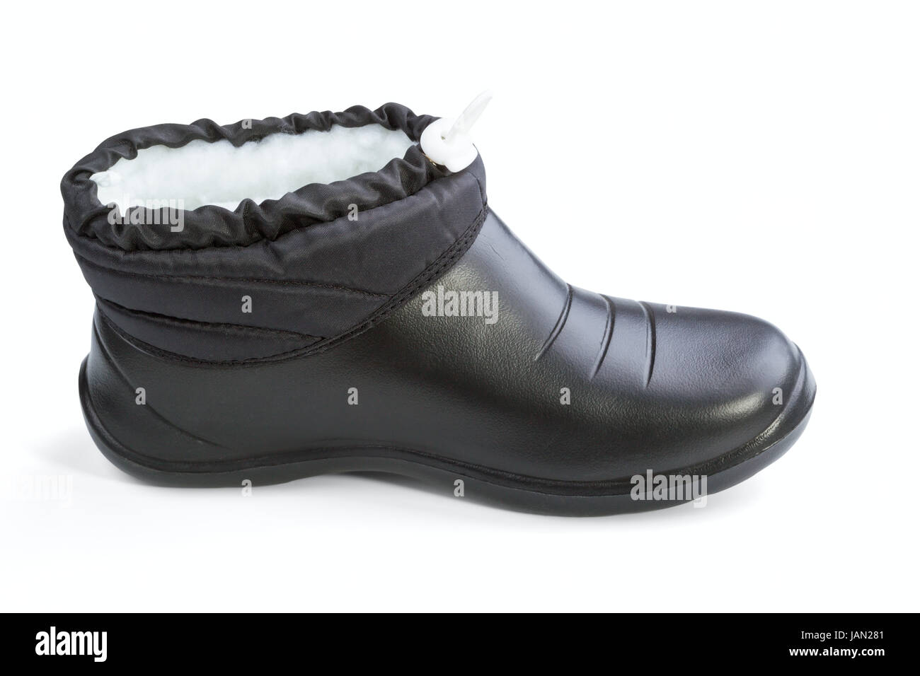 Black rubber female shoes on a white background Stock Photo - Alamy