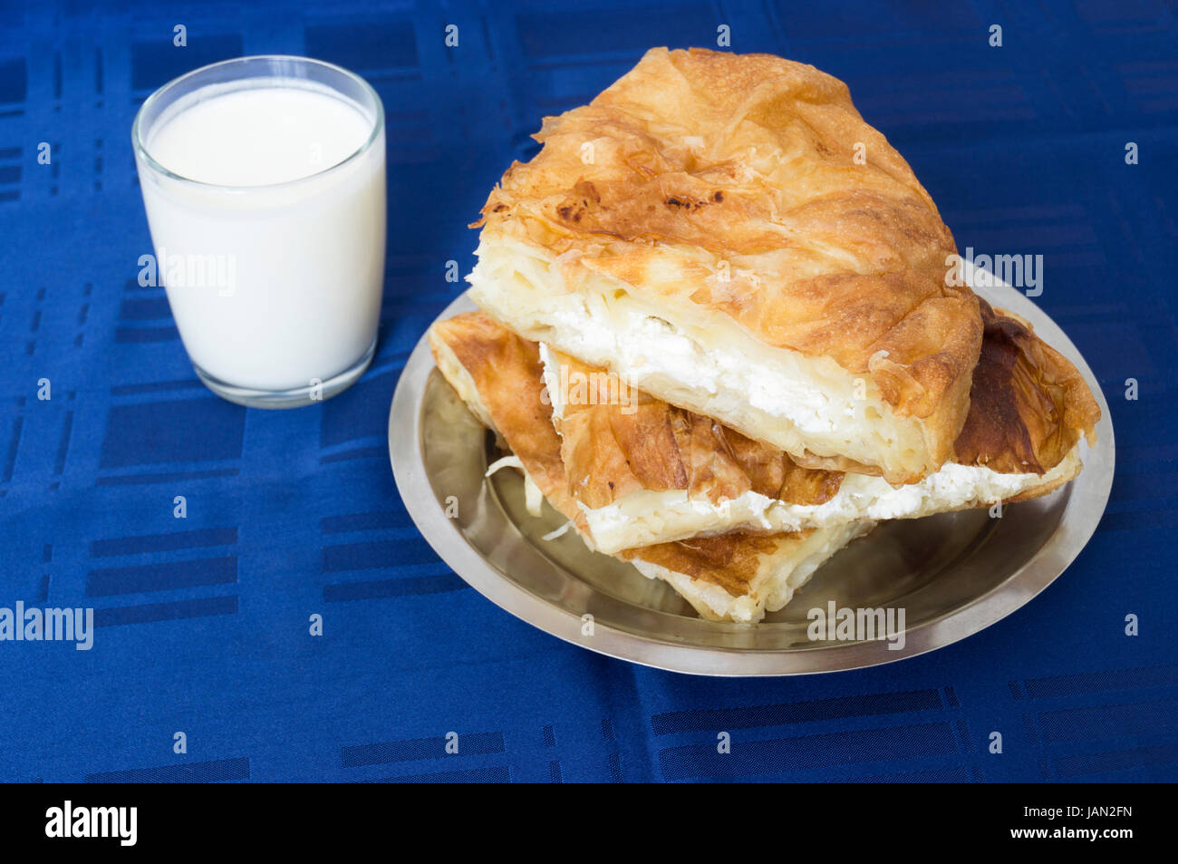 Burek with cheese and yogurt Stock Photo - Alamy