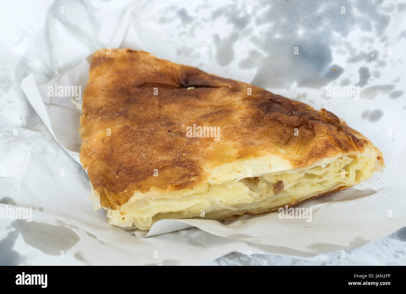Burek with meat on paper Stock Photo - Alamy