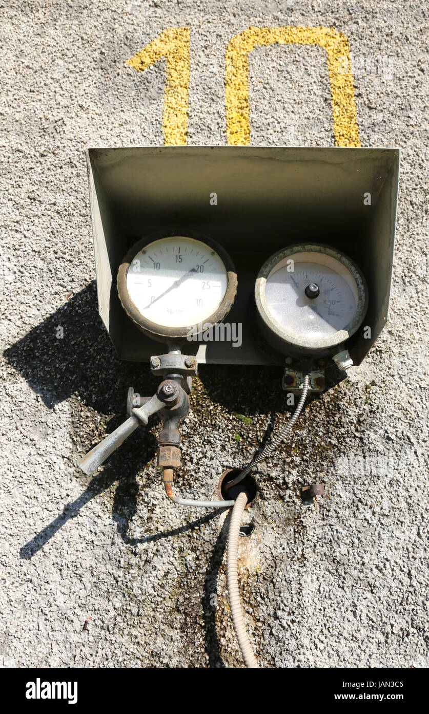 Two old manometers of a dismantled industrial plant Stock Photo - Alamy