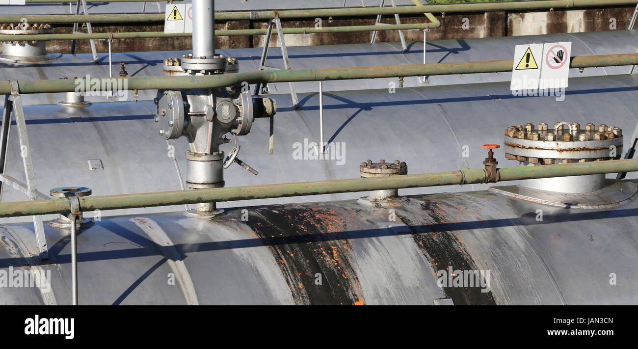 tanks in the storage of flammable materials with safety valves on top ...