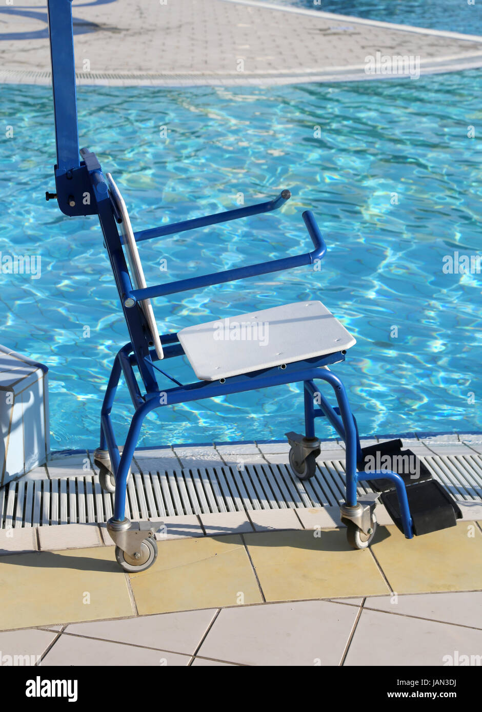 Special wheelchair for disabled people at the swimming pool of the ...
