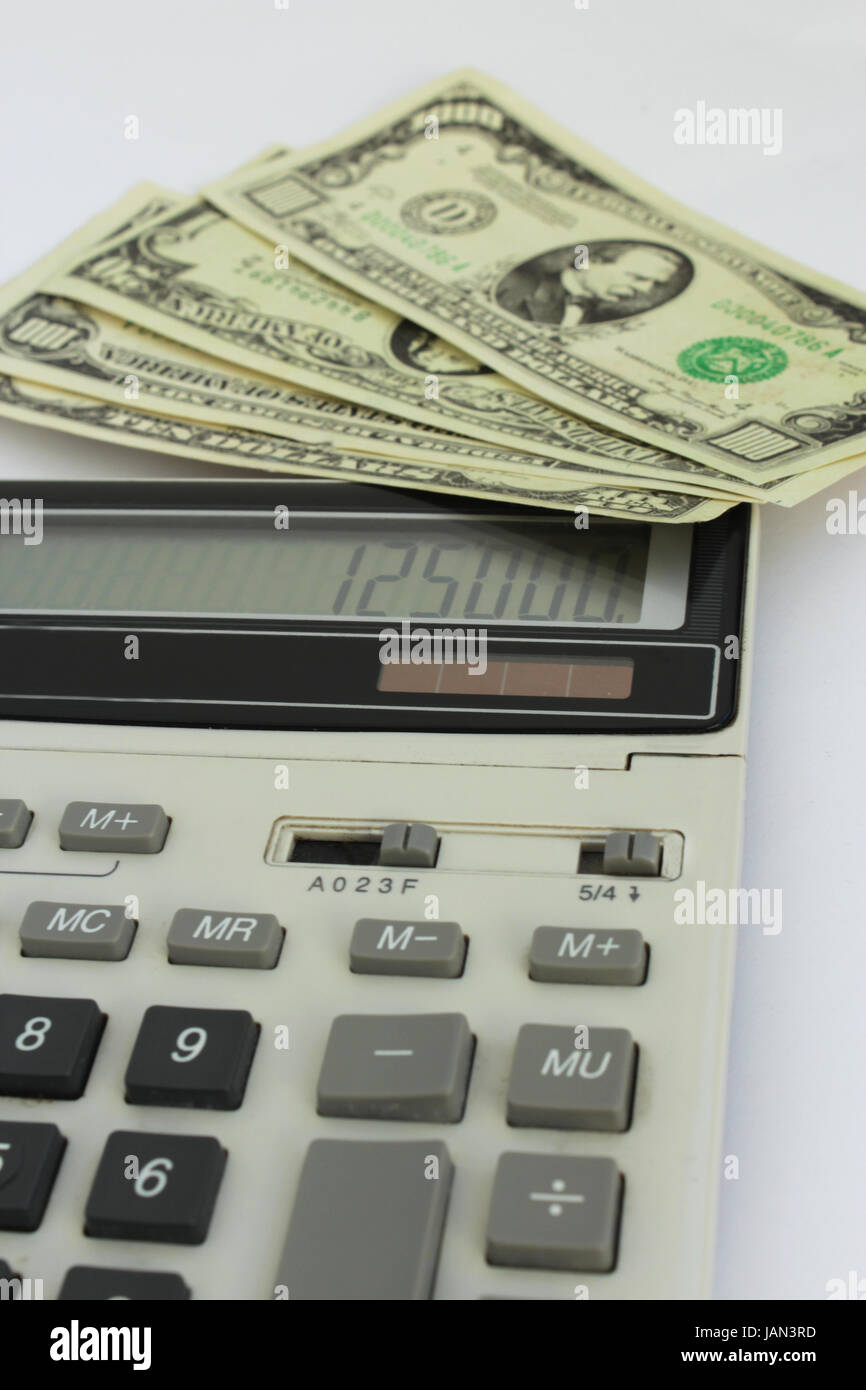 dollar bank notes and calculator on the white background Stock Photo ...