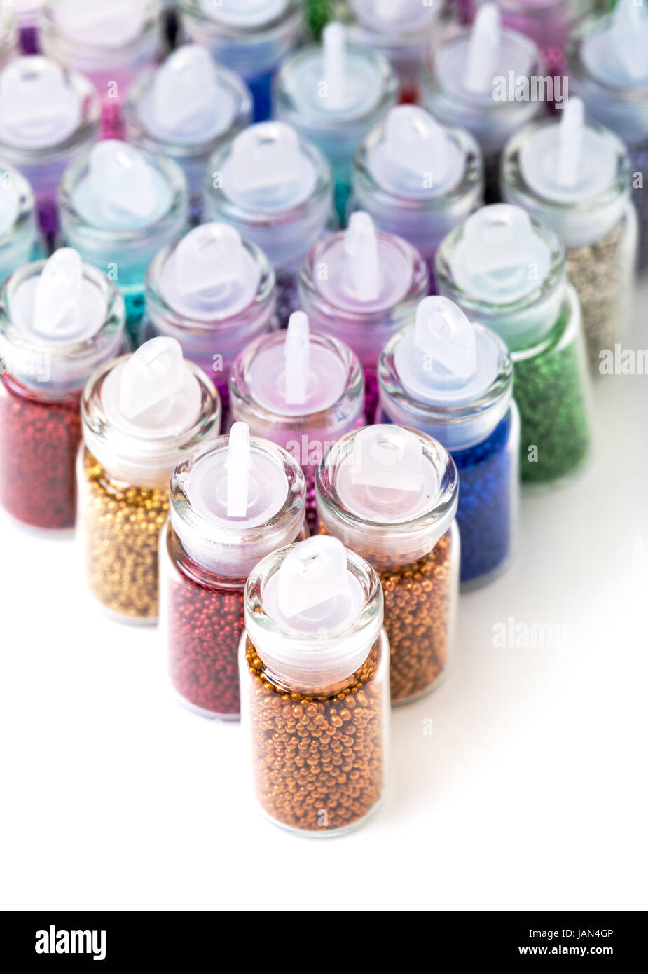 Small Glass Jars filled with Balls of Bead, closeup Stock Photo - Alamy