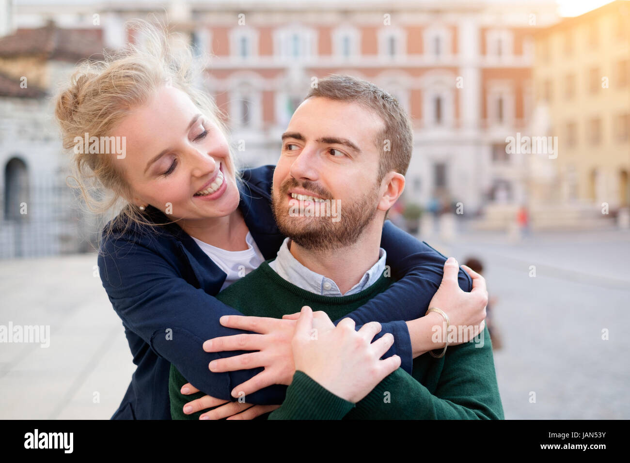 Portrait of real happy couple having fun during vacations Stock Photo ...