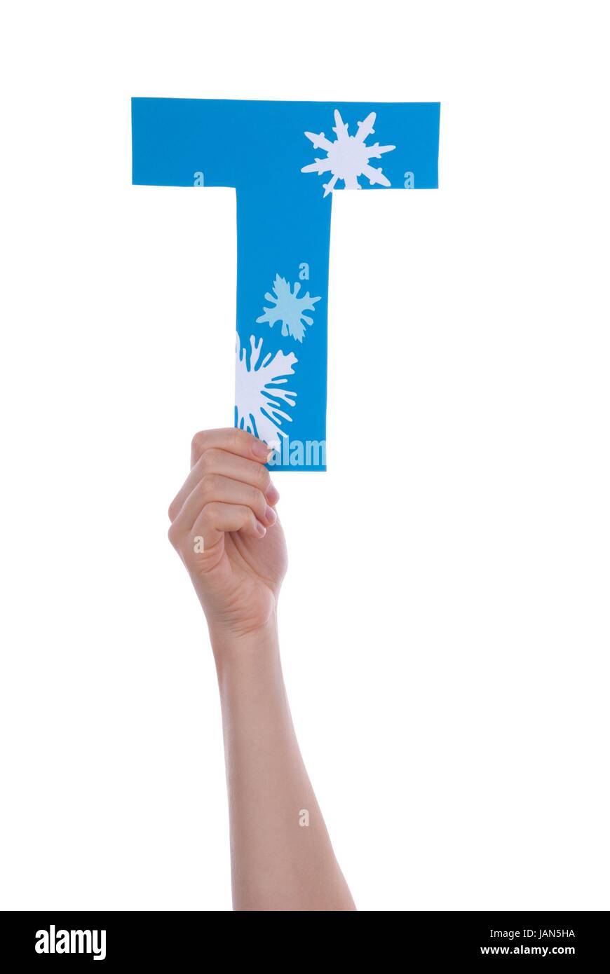 A Hand Holding the Blue and Snowy Letter T, Isolated Stock Photo - Alamy