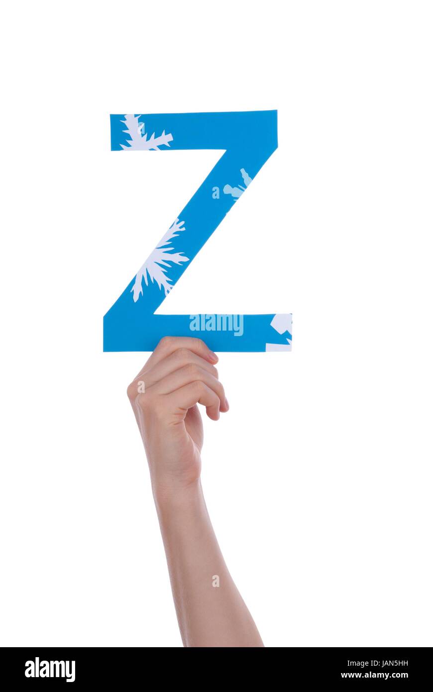 A Hand Holding the Snowy and Blue Letter Z, Isolated Stock Photo - Alamy