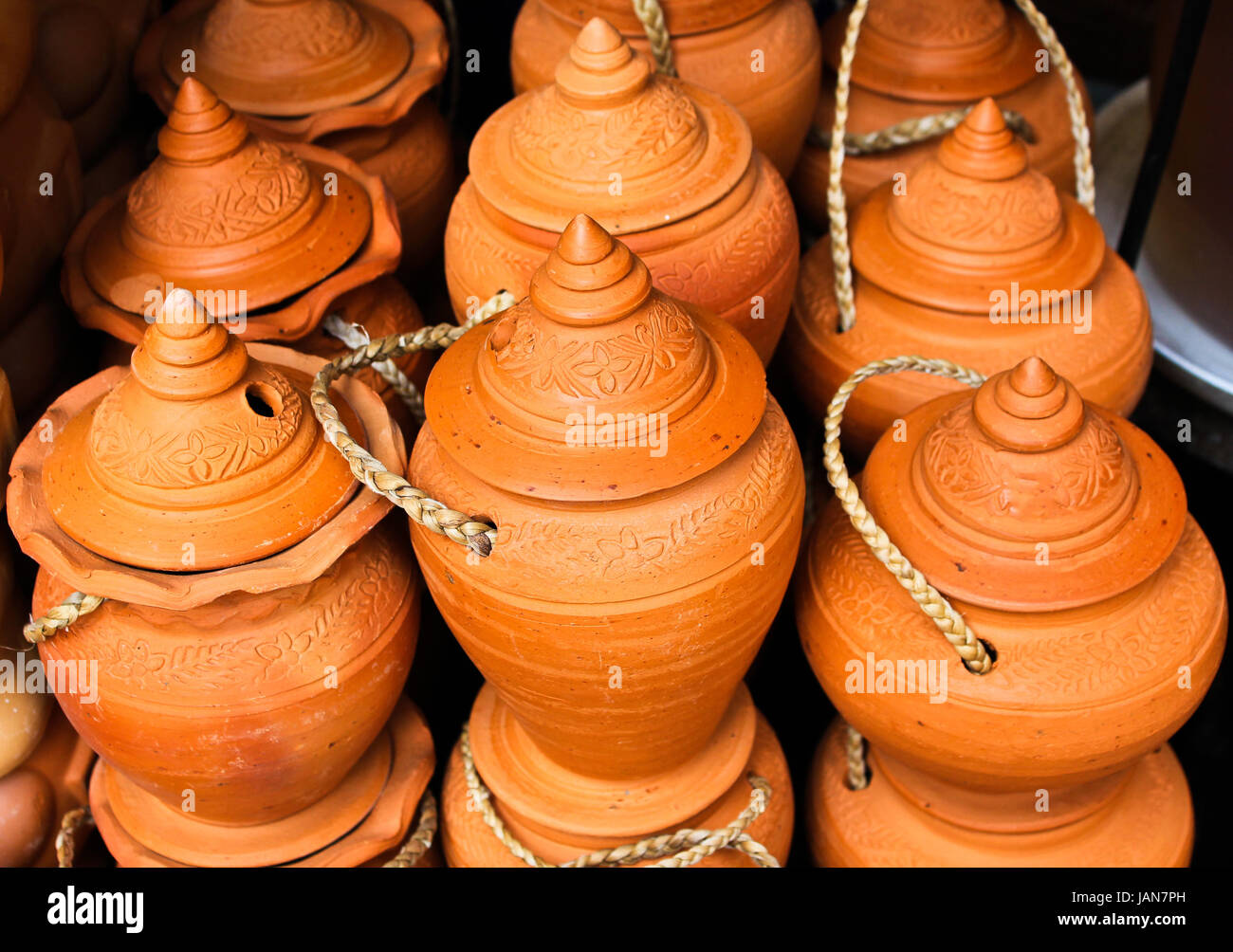 Thai style handmade clay pot Stock Photo - Alamy