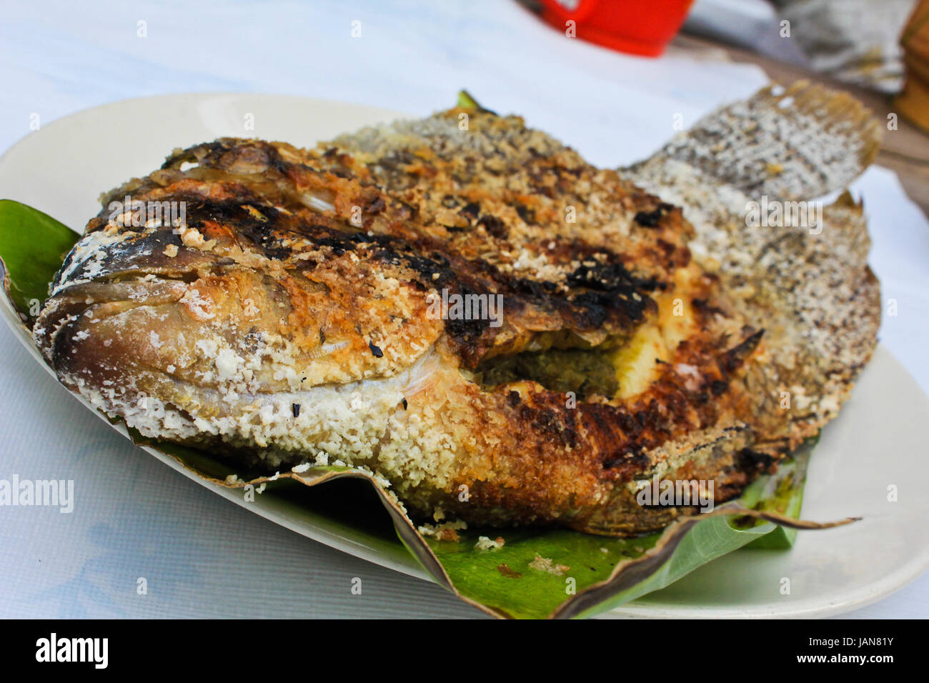 Grilled fish ready for eating Stock Photo - Alamy