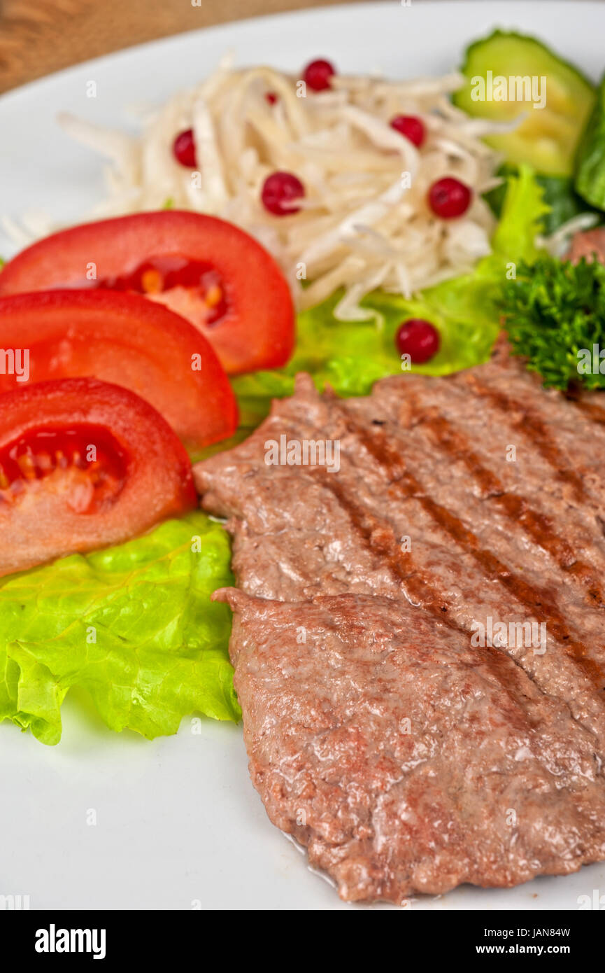 dish of meat chop with vegetable Stock Photo - Alamy