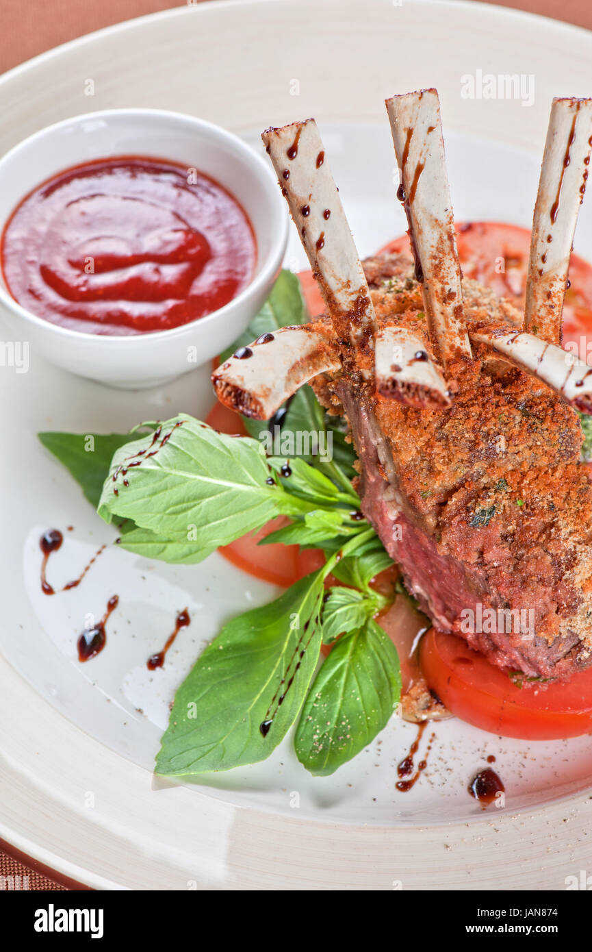 roasted lamb rib chops with vegetables Stock Photo - Alamy