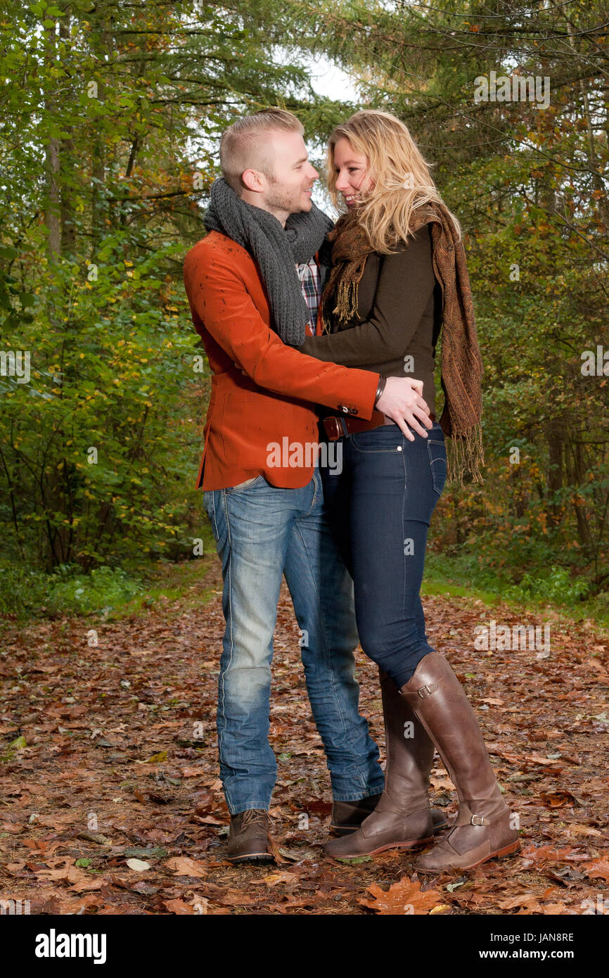 Happy young couple is having a nice time in october Stock Photo - Alamy