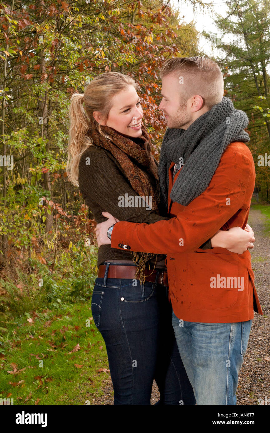 Happy young couple is having a nice time in october Stock Photo - Alamy