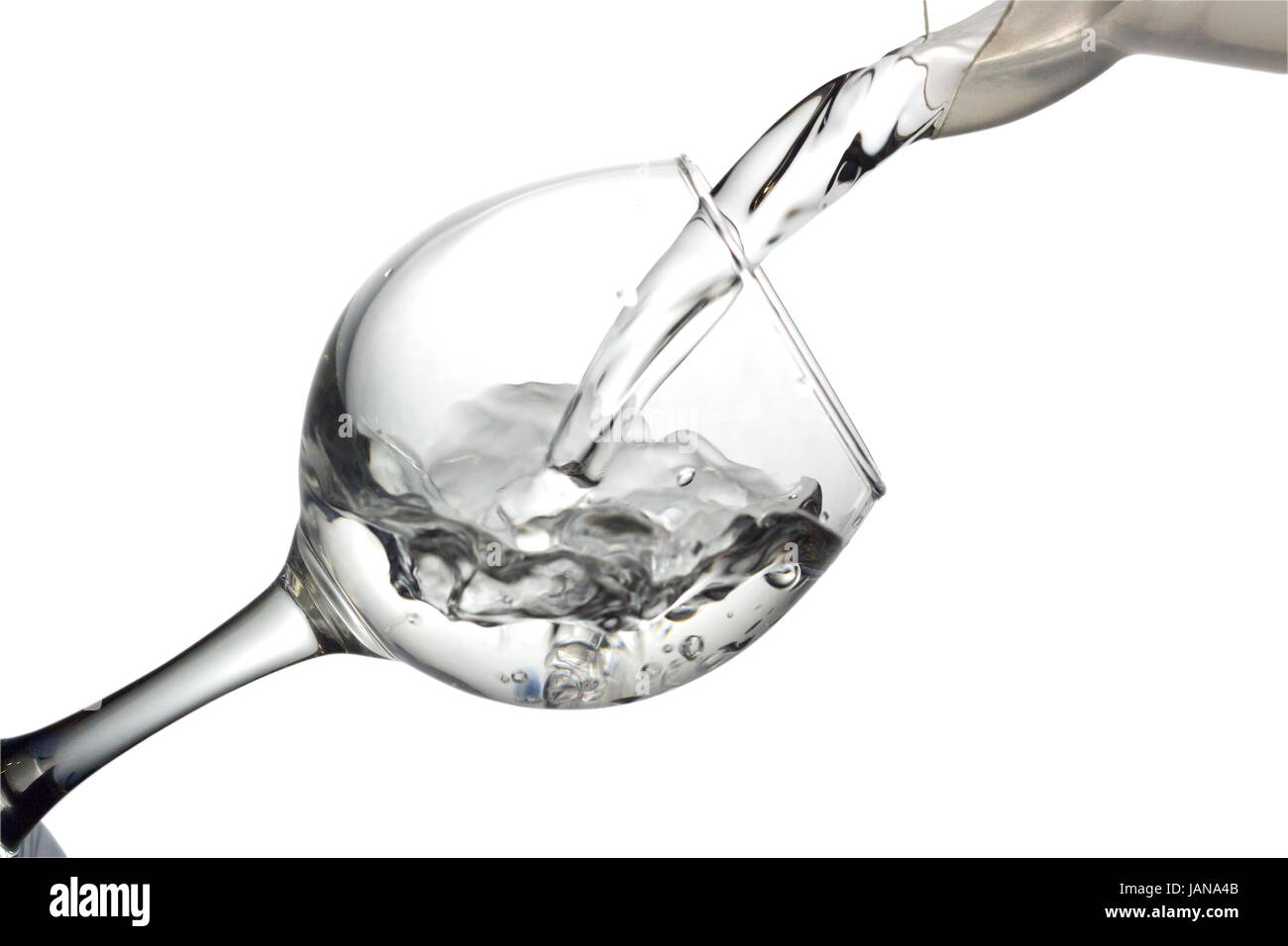 Colorless liquid, water,vodka is poured into a glass, liquid in a ...