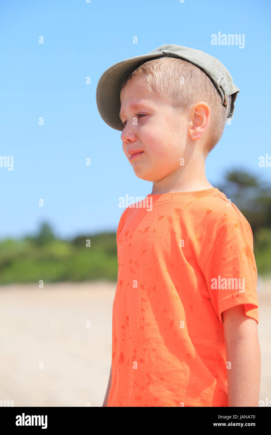 Sad child. Portrait of crying unhappy little boy outdoor Stock Photo ...