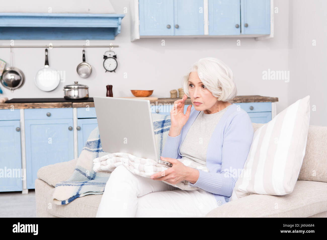 Grandmother using laptop computer Stock Photo - Alamy