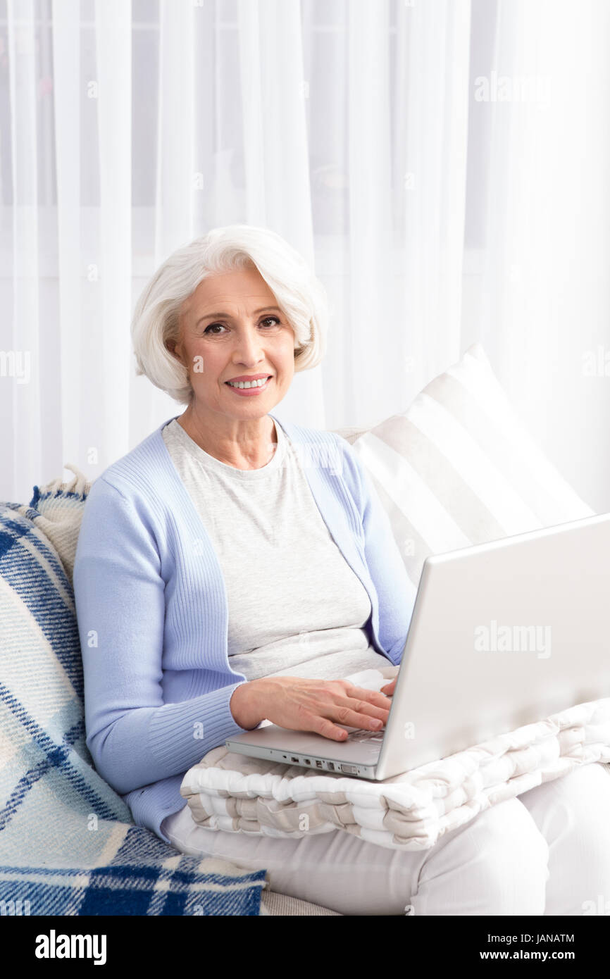 Grandmother using laptop computer Stock Photo - Alamy