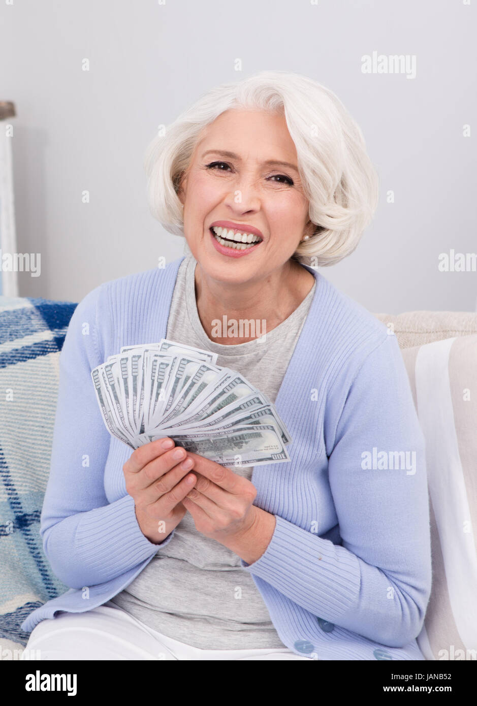 Money elderly hi-res stock photography and images - Alamy