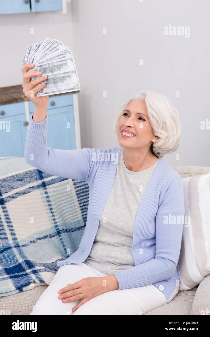 Happy old lady money hi-res stock photography and images - Alamy