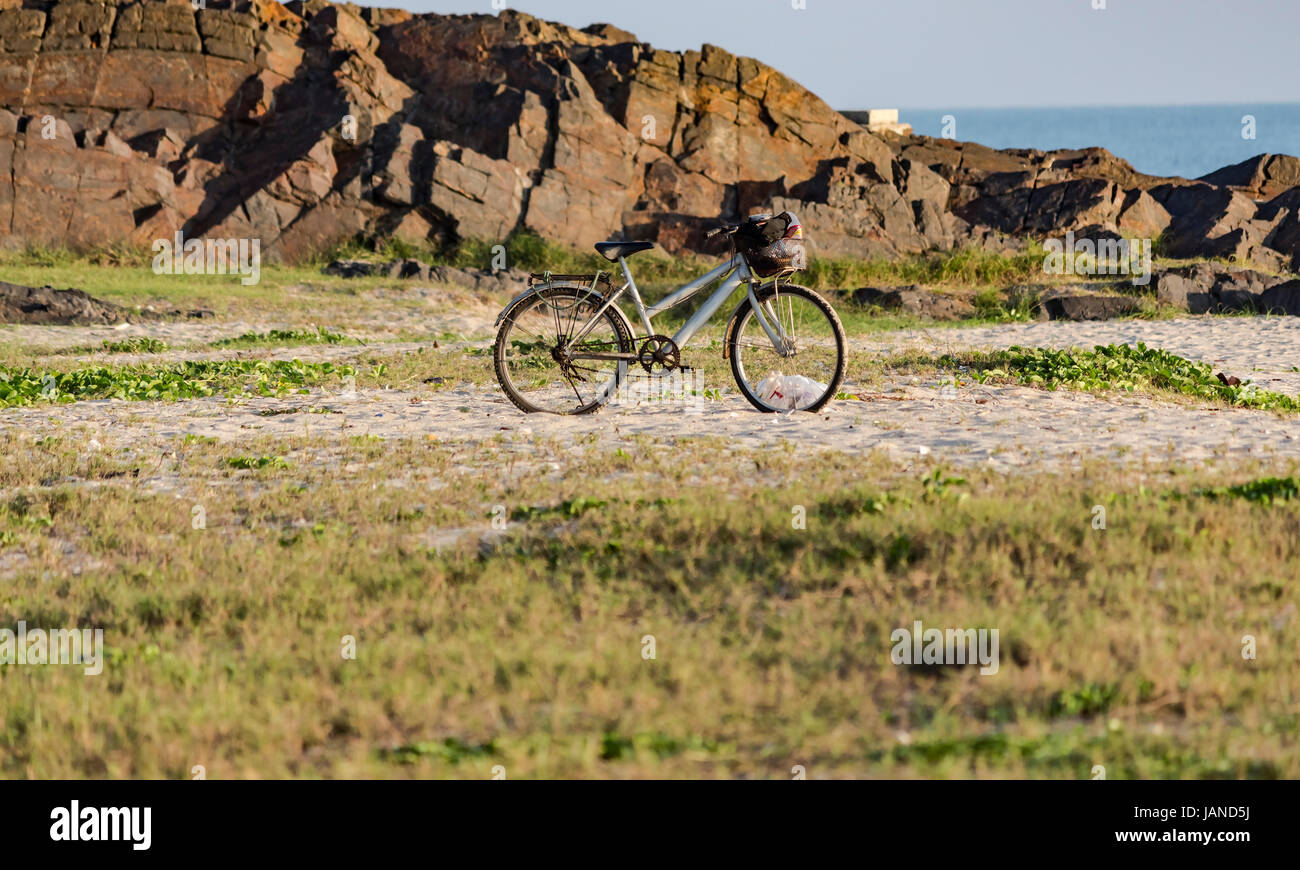 Bicycle and sand in the morning Stock Photo - Alamy