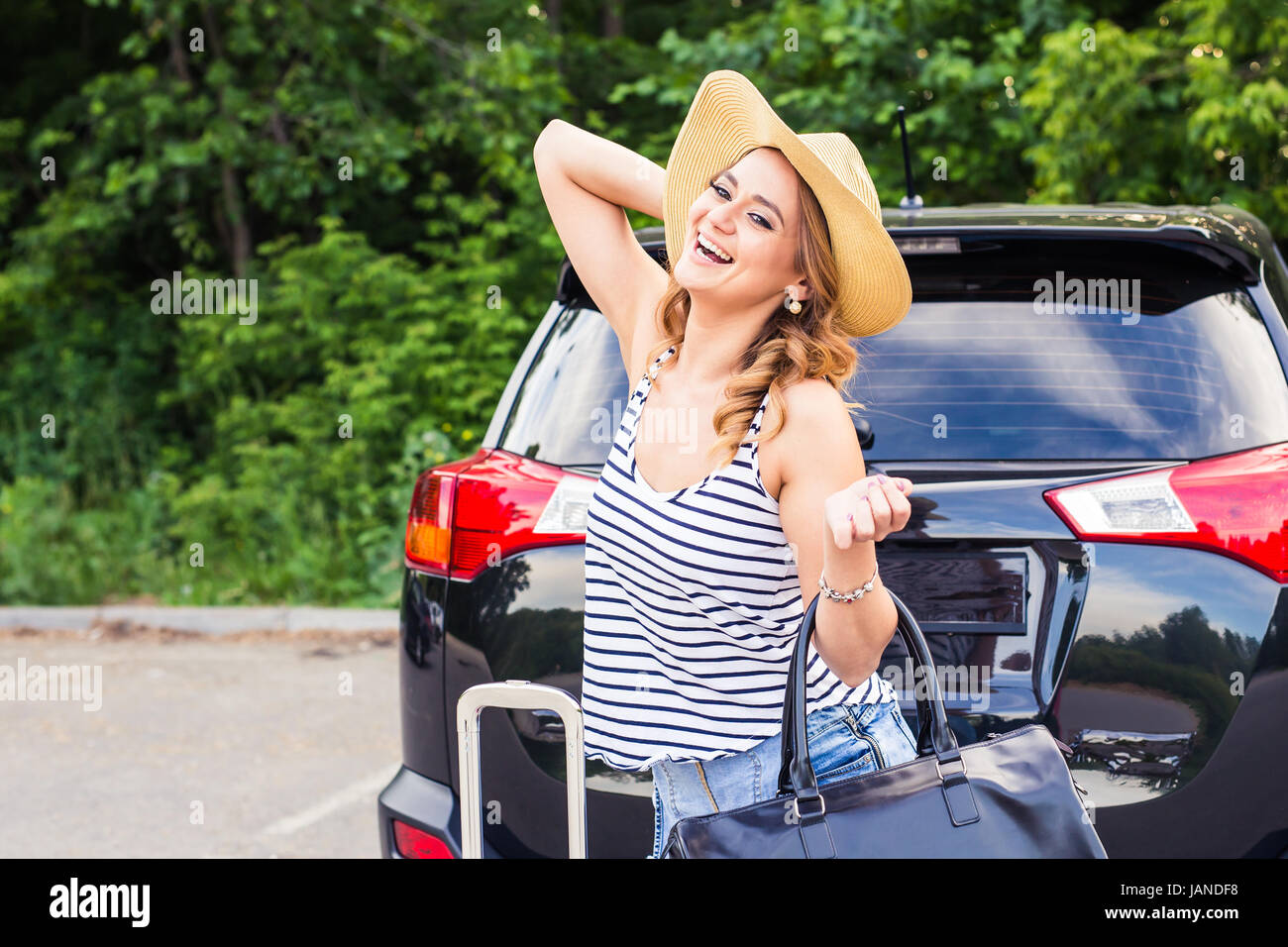 Summer vacation car road trip freedom concept. Happy woman cheering ...