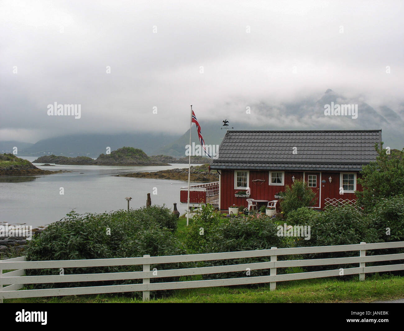 Red rorbuer along the coast in the Lofoten islands (Norway Stock Photo ...