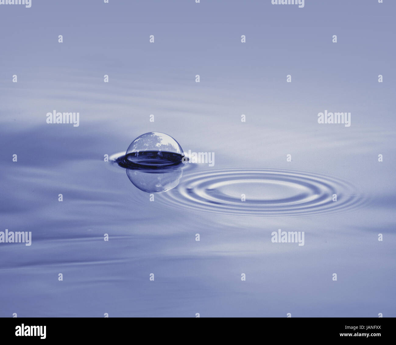 Bubble and ripple on water Stock Photo - Alamy