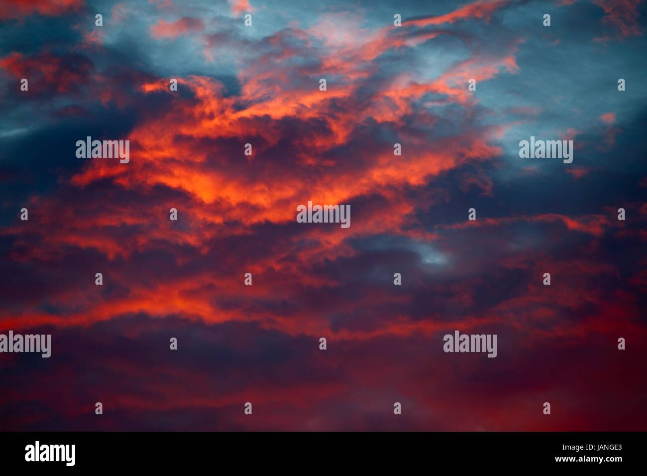 Sunset sky with dark clouds Stock Photo - Alamy